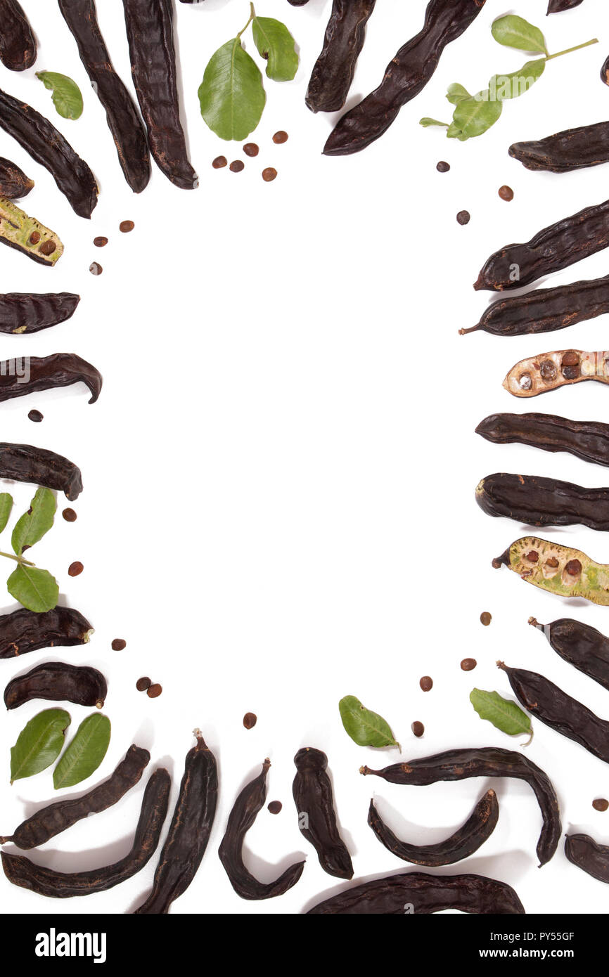 carob fruits assortment isolated over a white background Stock Photo ...