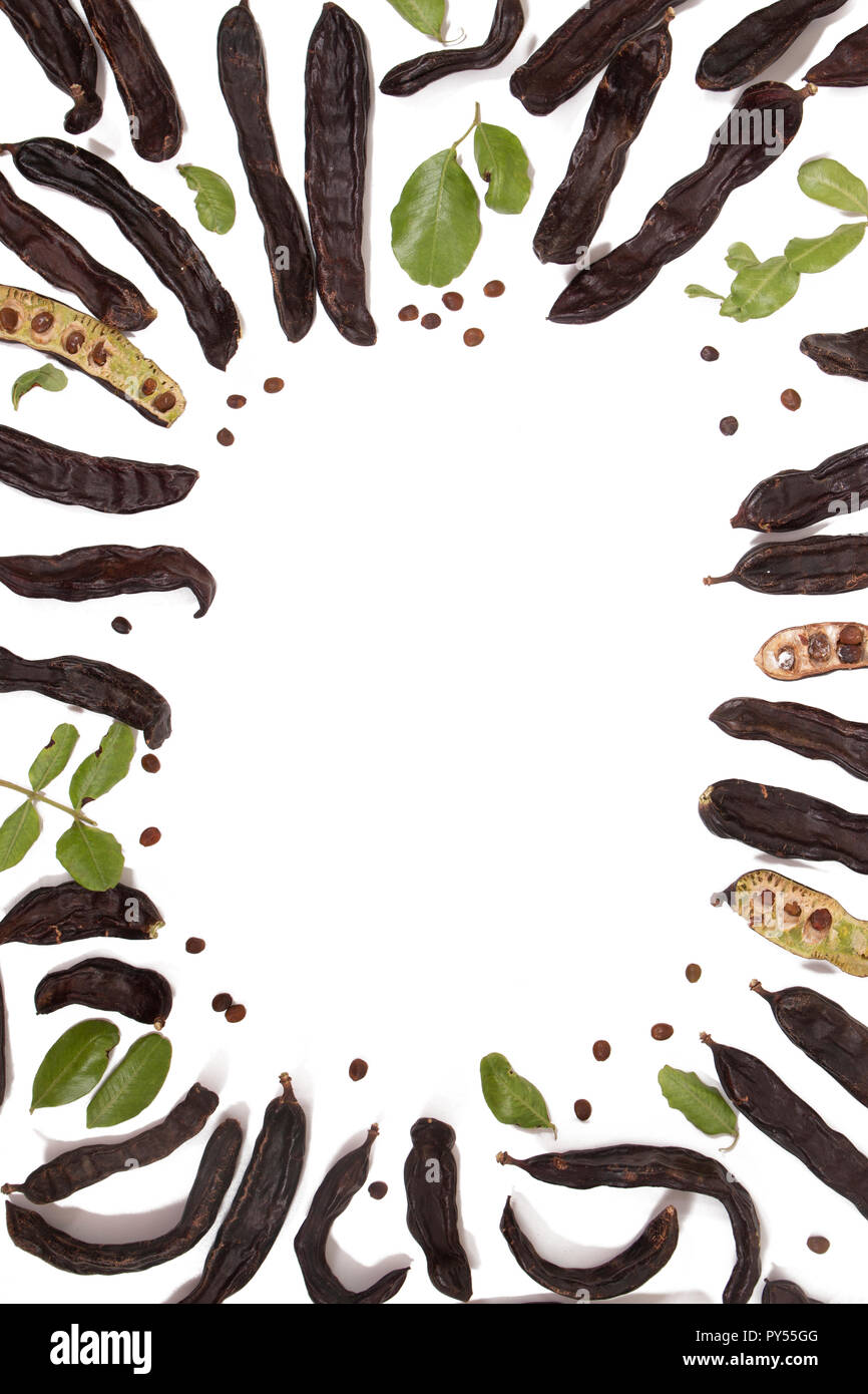 carob fruits assortment isolated over a white background Stock Photo ...