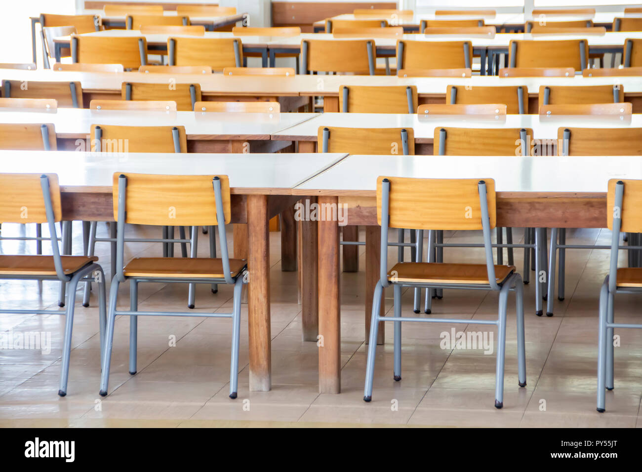 Interior view of an empty school canteen with tables and chairs Stock ...