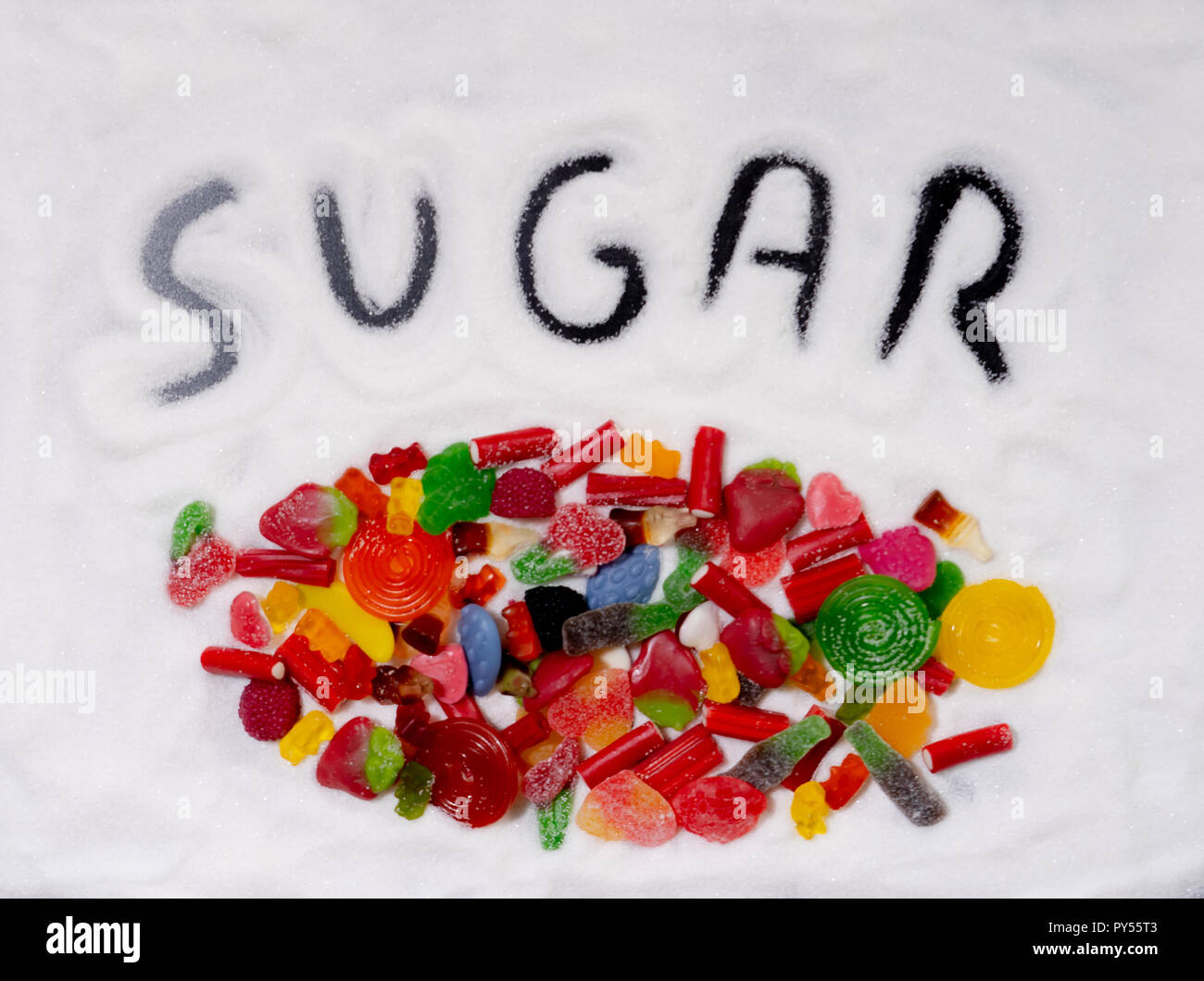 Colorful selection of different child sweets candies and treats with ...