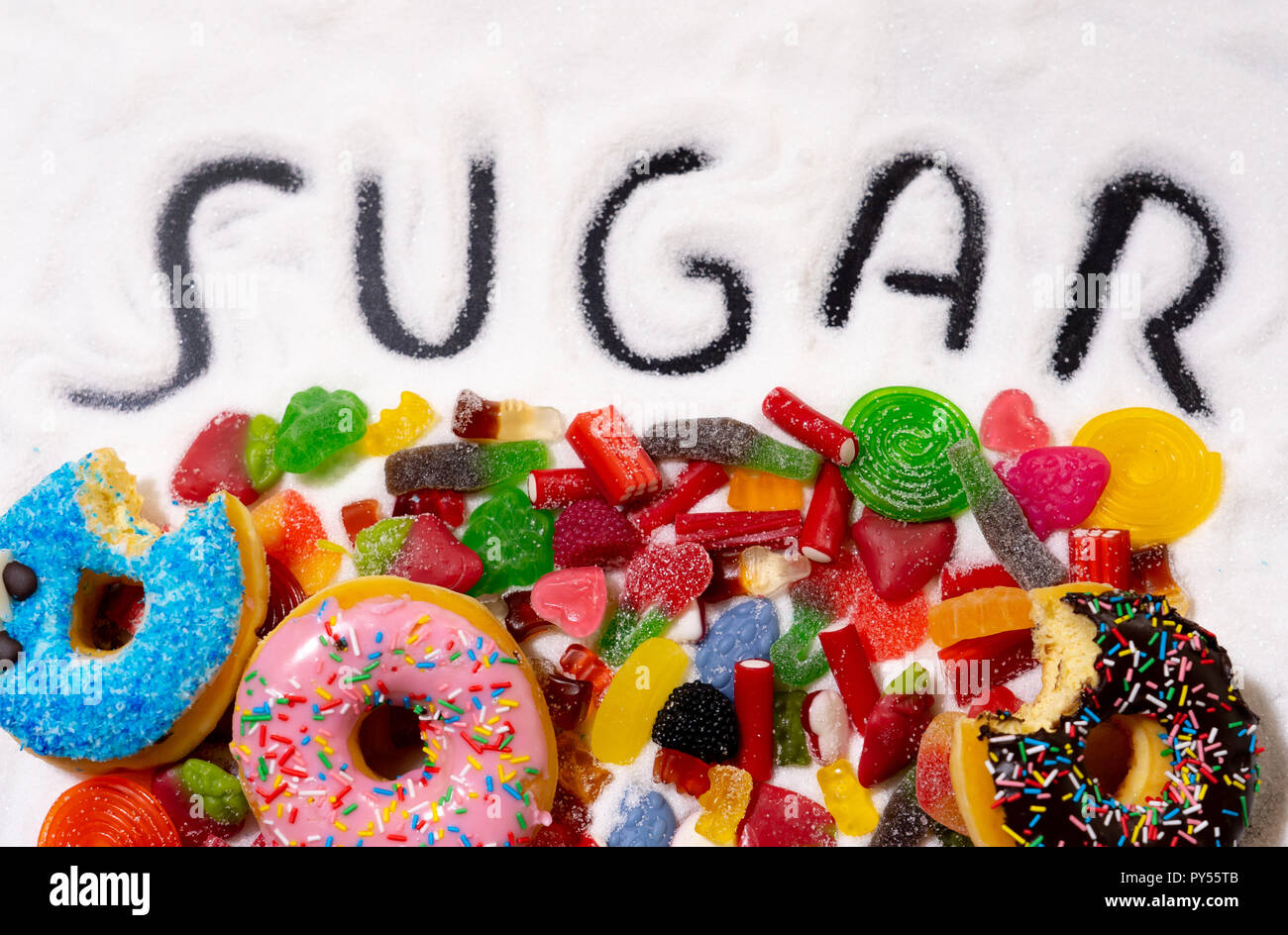 Colorful selection of different child sweets candies and treats with ...