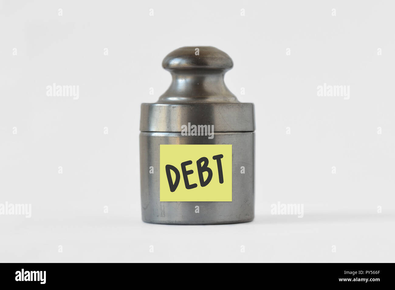 Weight with the word Debt written on paper note - Debt concept Stock ...