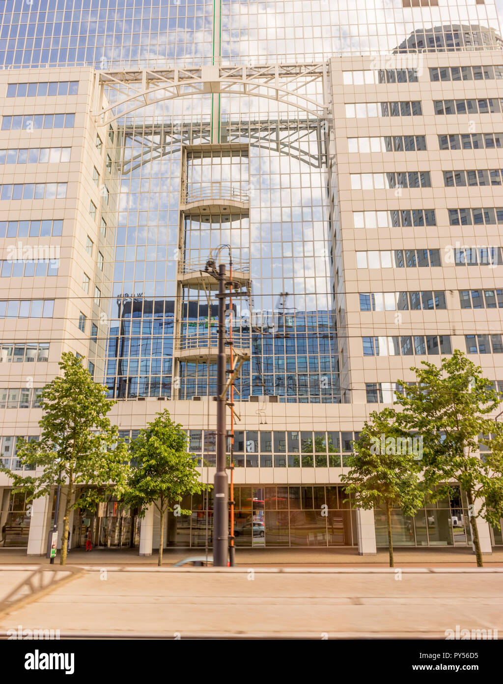 Rotterdam, Netherlands - 27 May: Tall glass building at Rotterdam on 27 ...