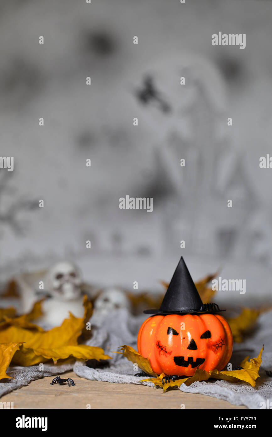 Orange scary pumpkin with witch hat. Halloween background. Closeup ...