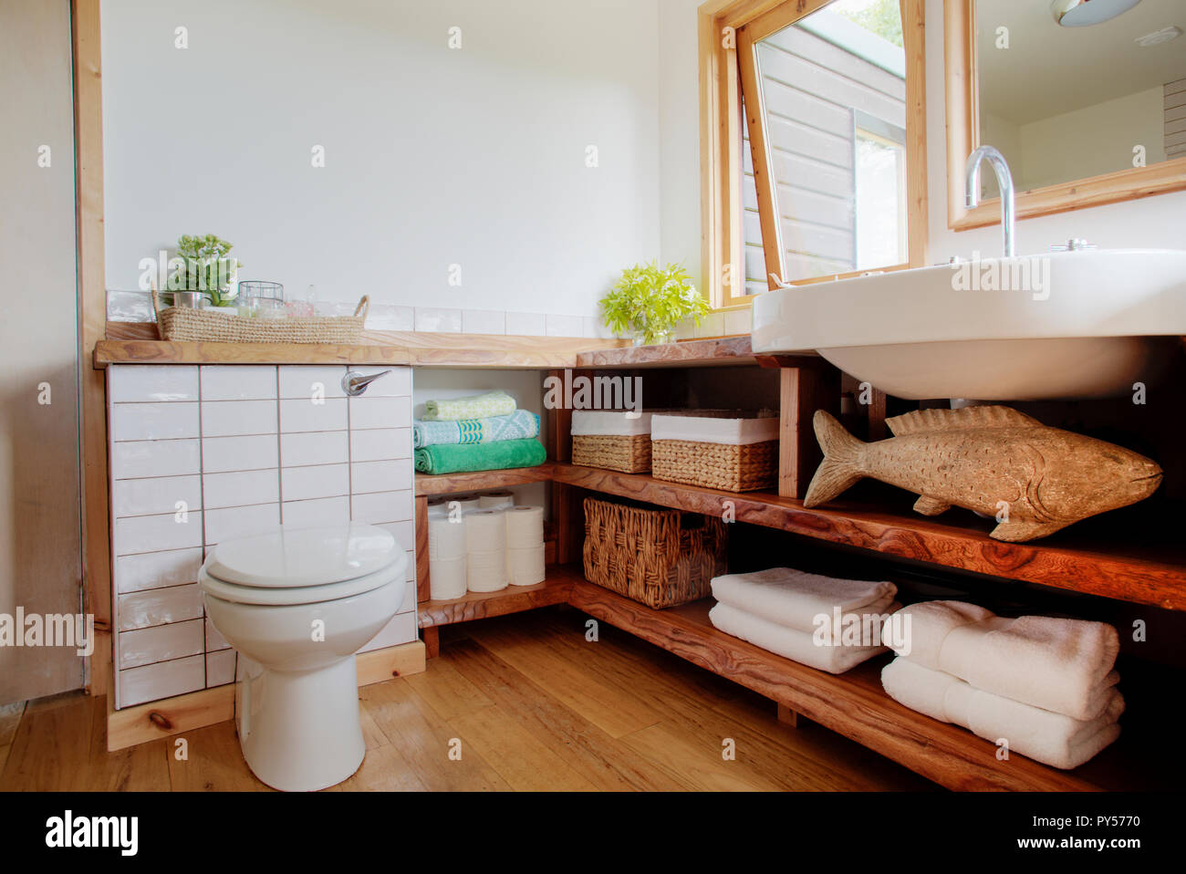 A close up shot of a modern bathroom interior, there is a toilet ...