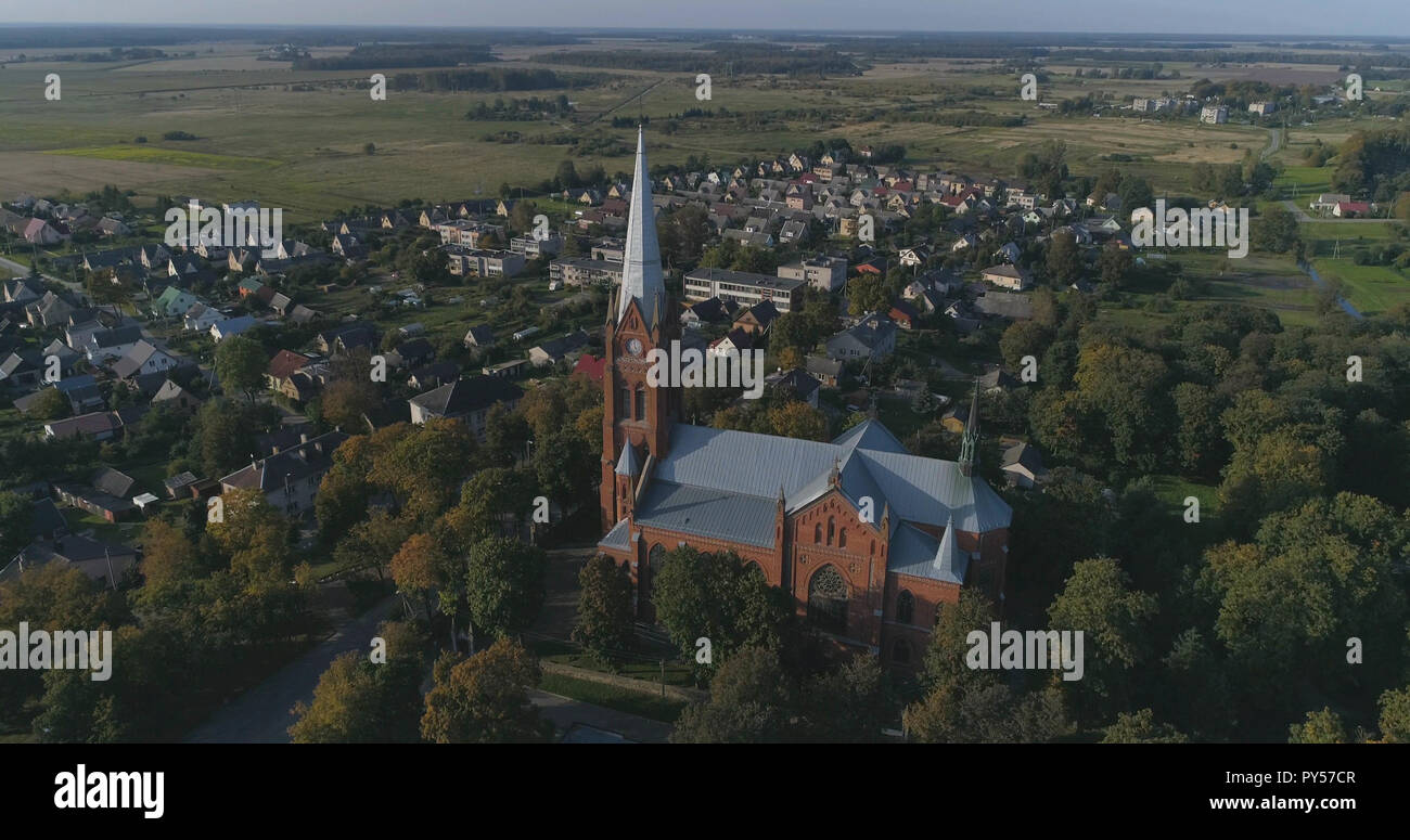 Aerial shot of St. John church of Ramygala in Lithuania. Panorama of ...
