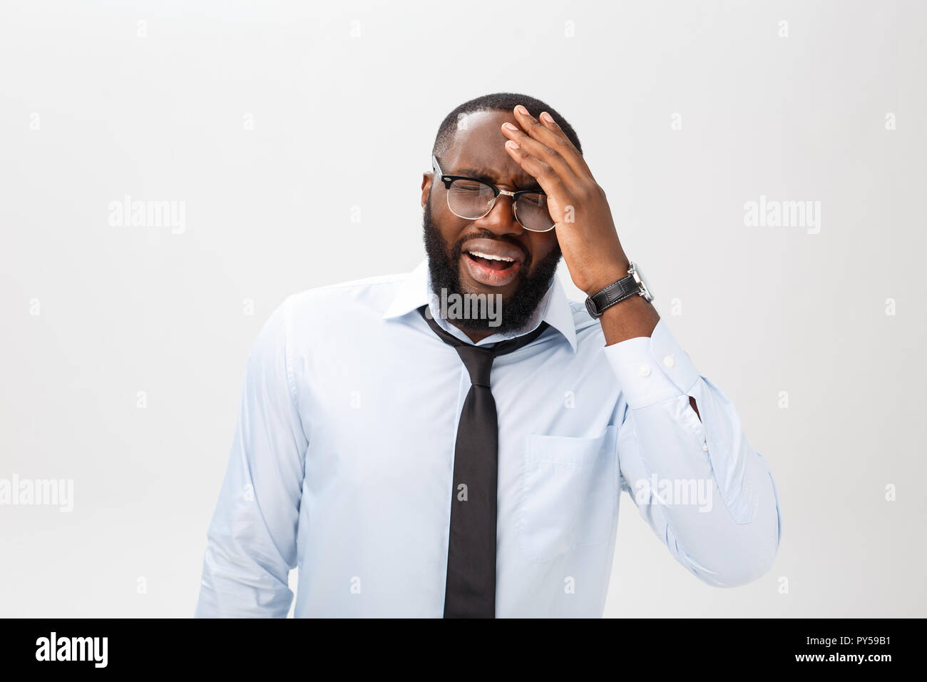 Portrait of desperate annoyed black male screaming in rage and anger ...