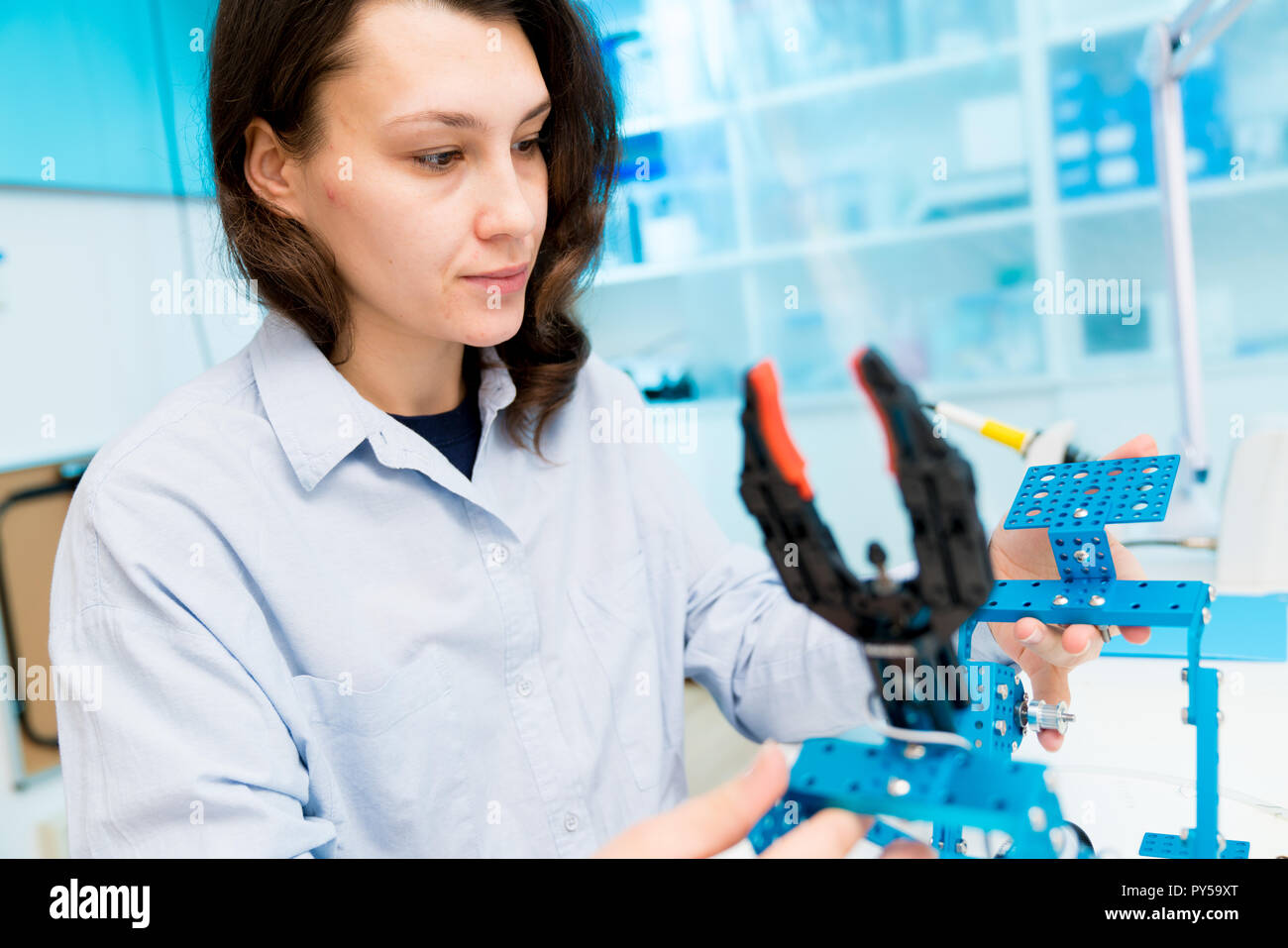 Young woman in CNC and robotics laboratory Stock Photo - Alamy
