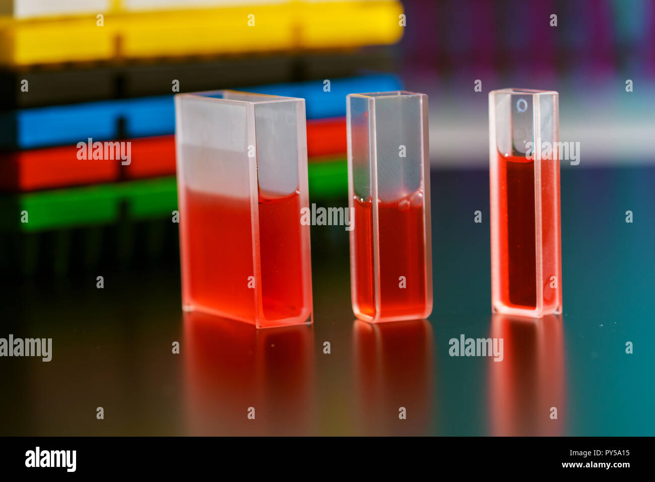 Quartz cuvette with the sample liquid for measurement Stock Photo - Alamy