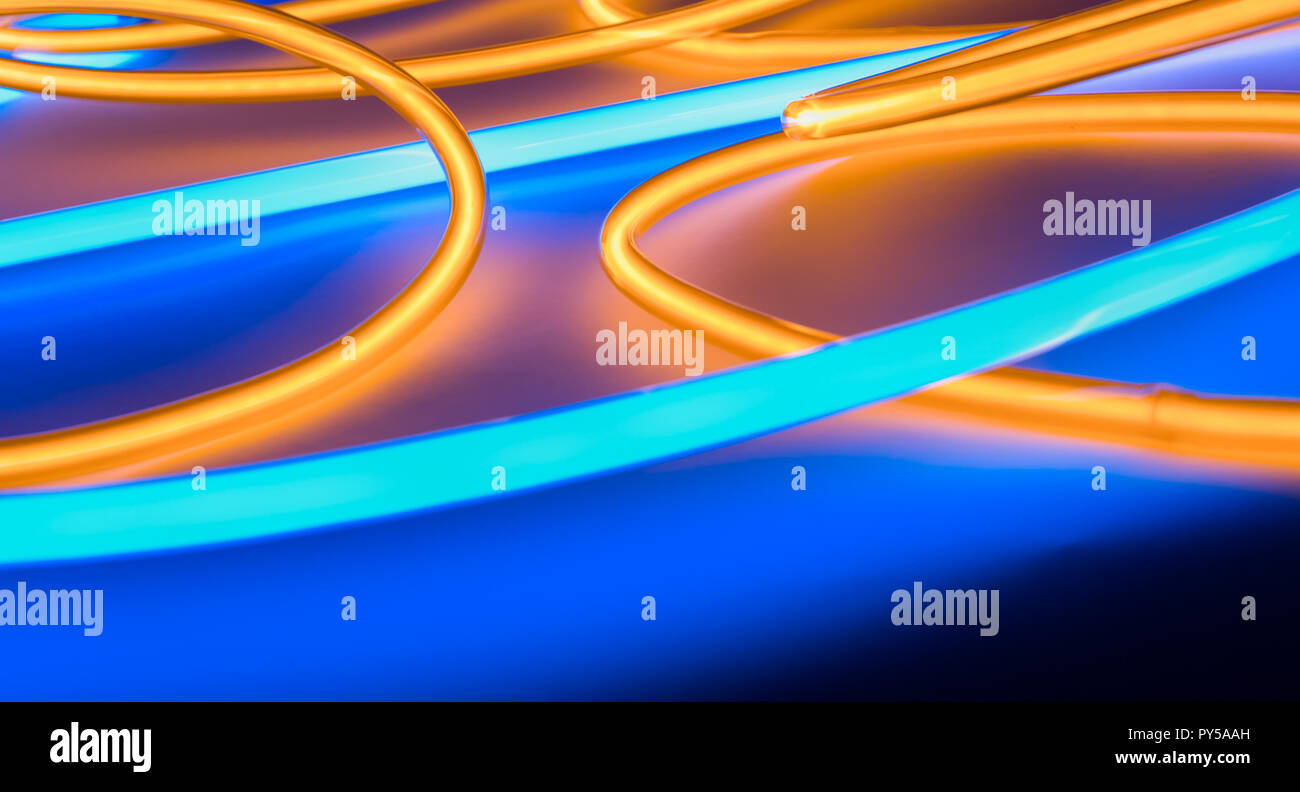Blue orange neon handmade light sign Stock Photo - Alamy