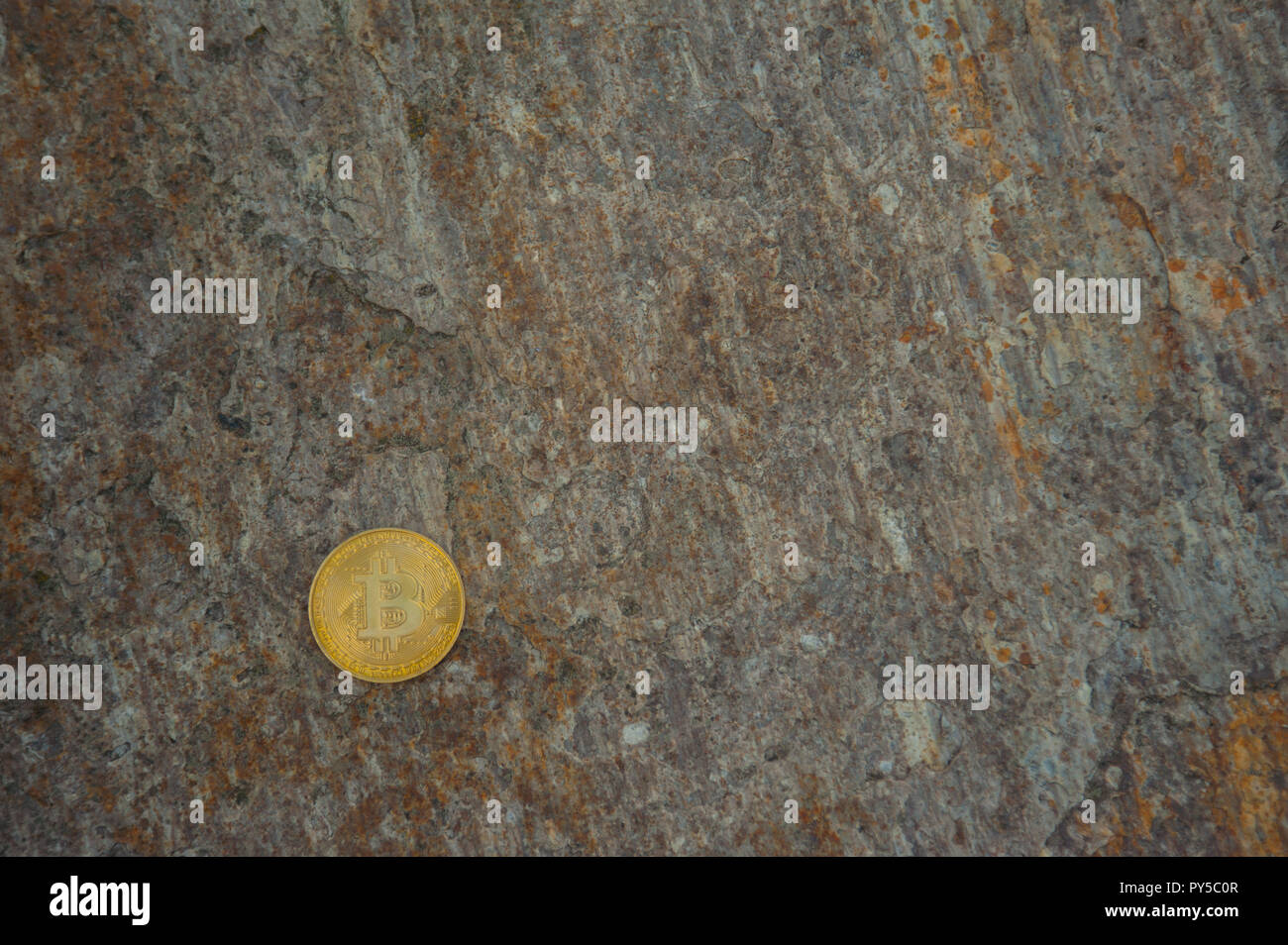 Bitcoin with metal texture background Stock Photo - Alamy