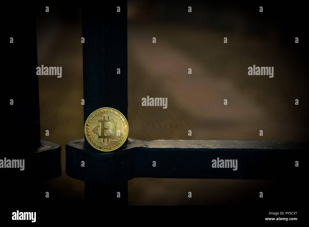 Bit coin on steel gate Stock Photo - Alamy