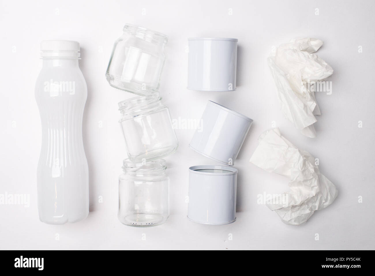 Recyclable garbage consisting of glass, plastic, metal and paper on ...