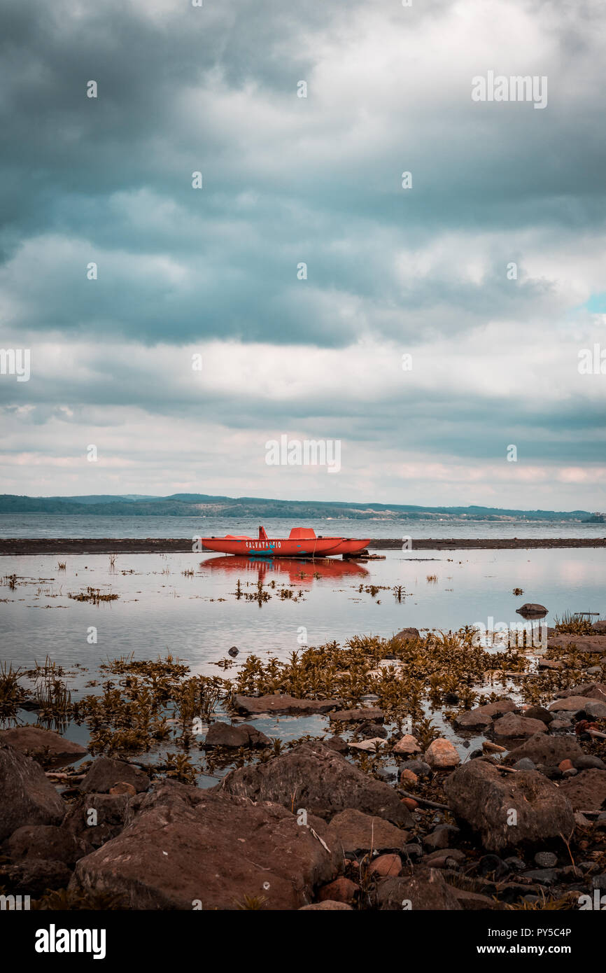 Emergency rowing boat with white Italian lettering "rescue" on the ...