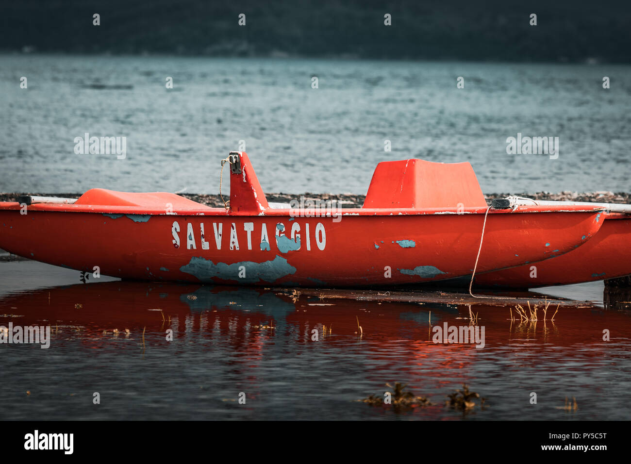 Emergency rowing boat with white Italian lettering "rescue" on the ...