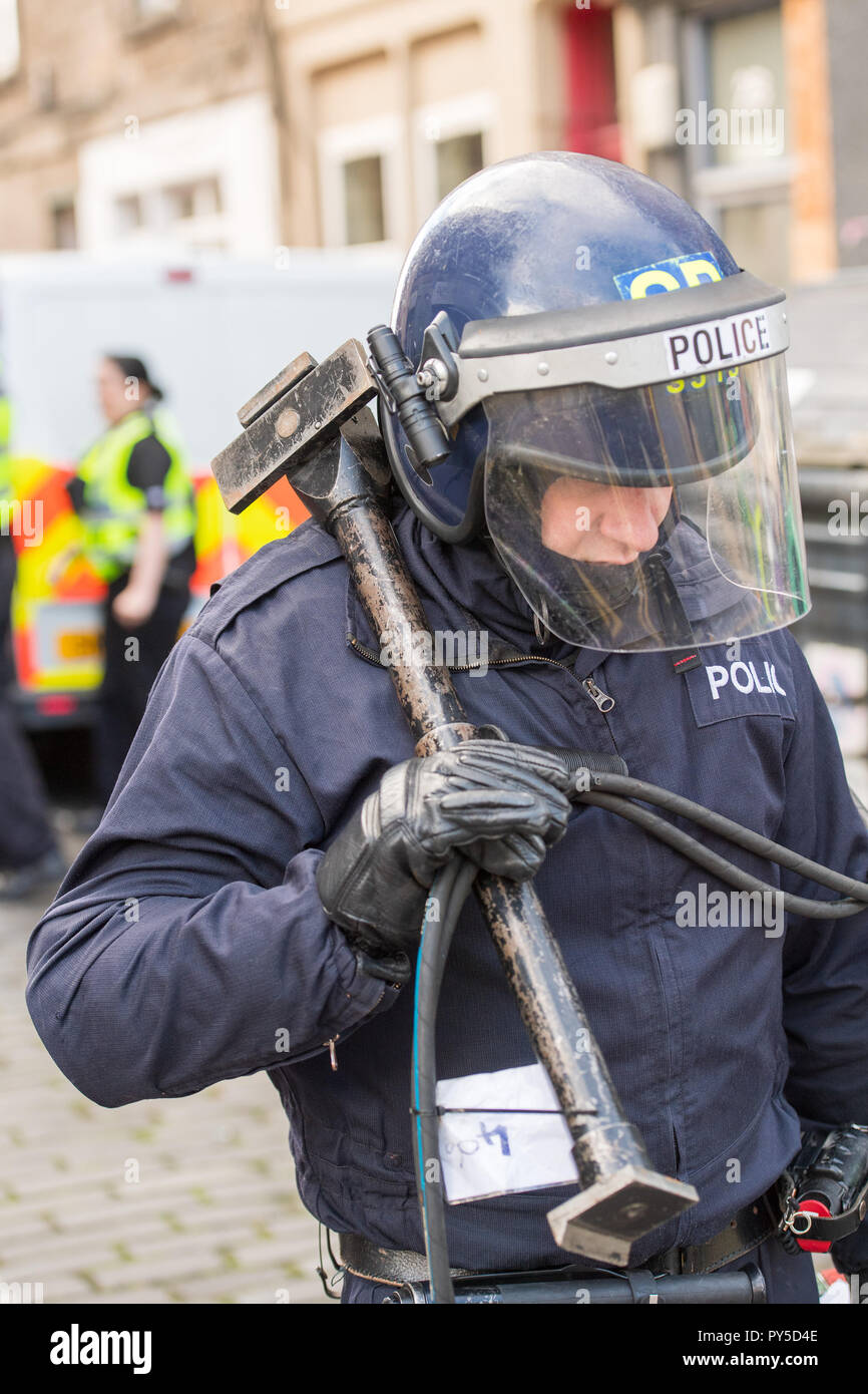 Man walking police hi-res stock photography and images - Alamy