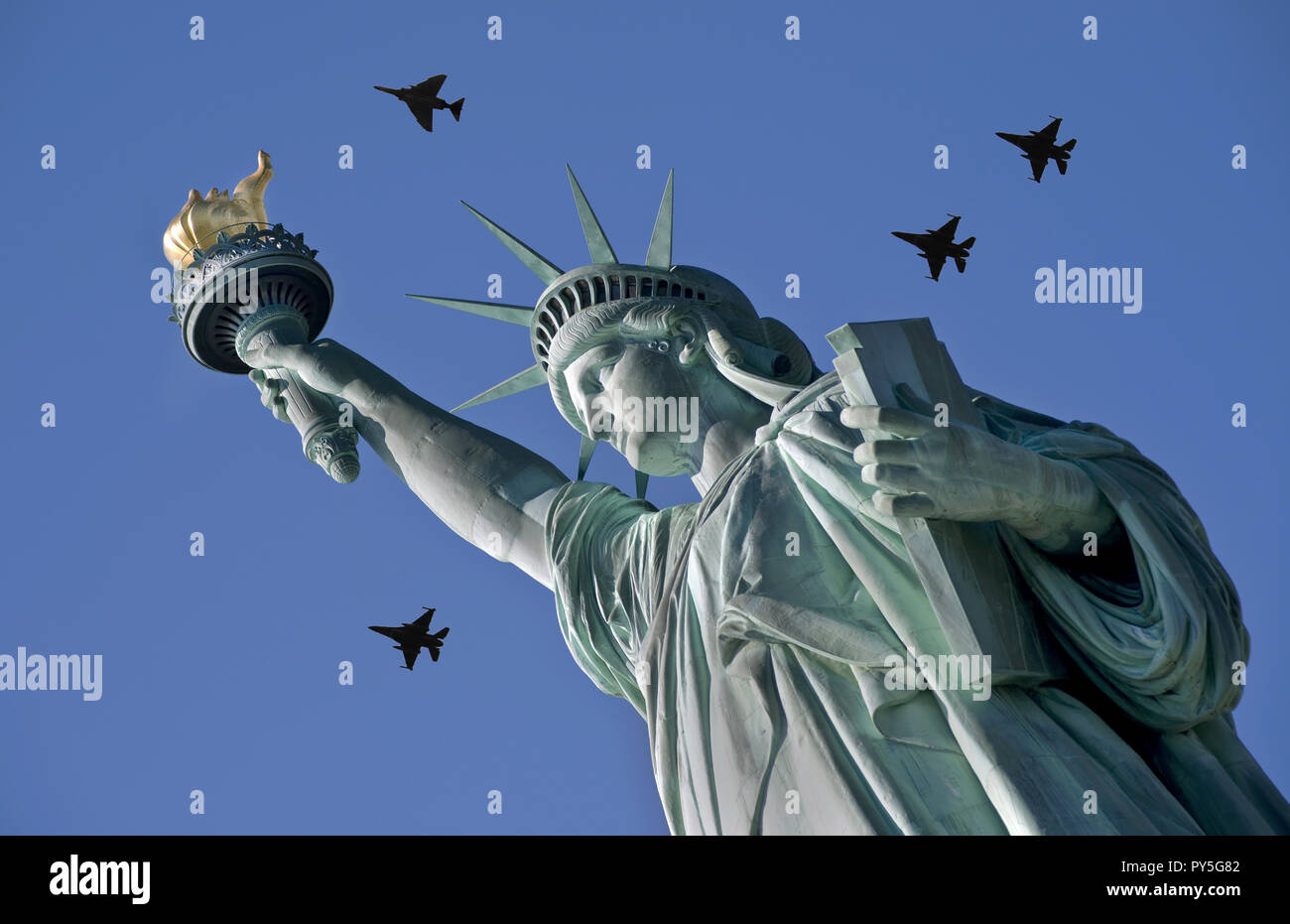 Statue of Liberty in NYC with jets flying overhead Stock Photo - Alamy
