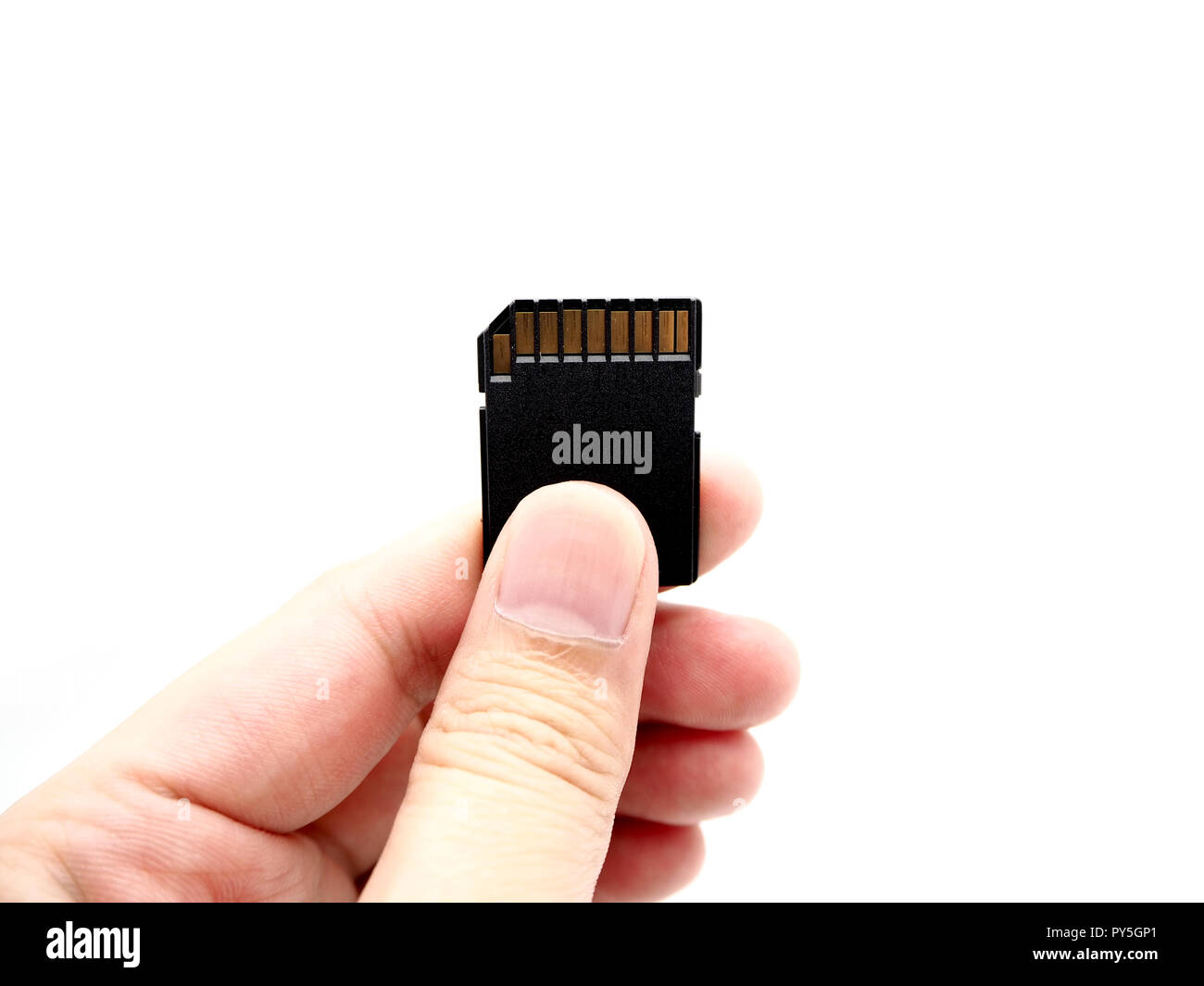 Hand holding a memory card isolated on white background Stock Photo - Alamy