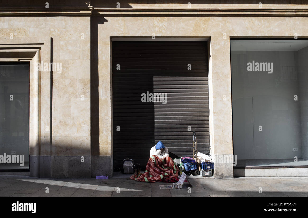 October 24, 2018 - Salamanca, Spain - A homeless person seen seated at ...