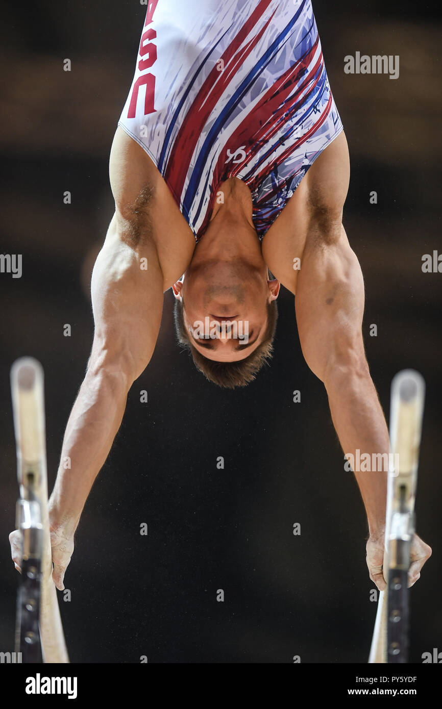 Doha, Qatar. 26th Oct, 2018. SAM MIKULAK competes on the parallel bars ...