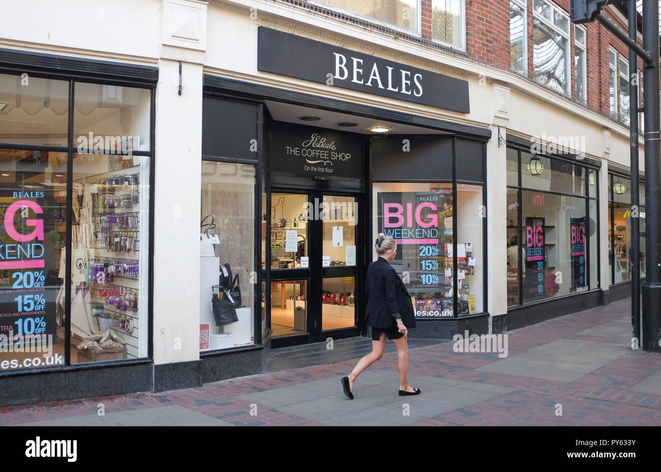 Worthing West Sussex Views & retail shops - Woman walking past Beales ...