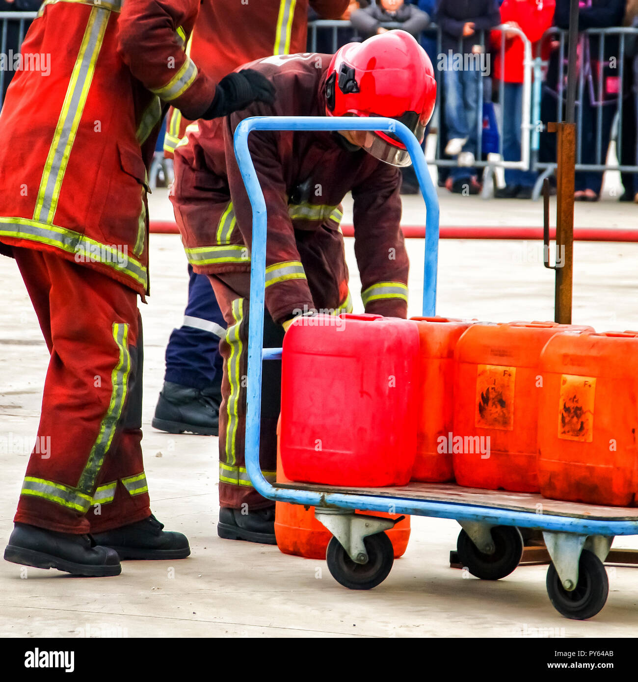 close up single fireman in fire fighting protection suit and equipment ...