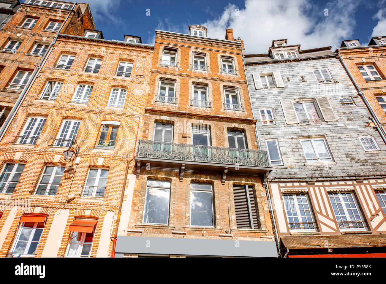 Beautiful facades of the old buildings at the harbour of Honfleur ...