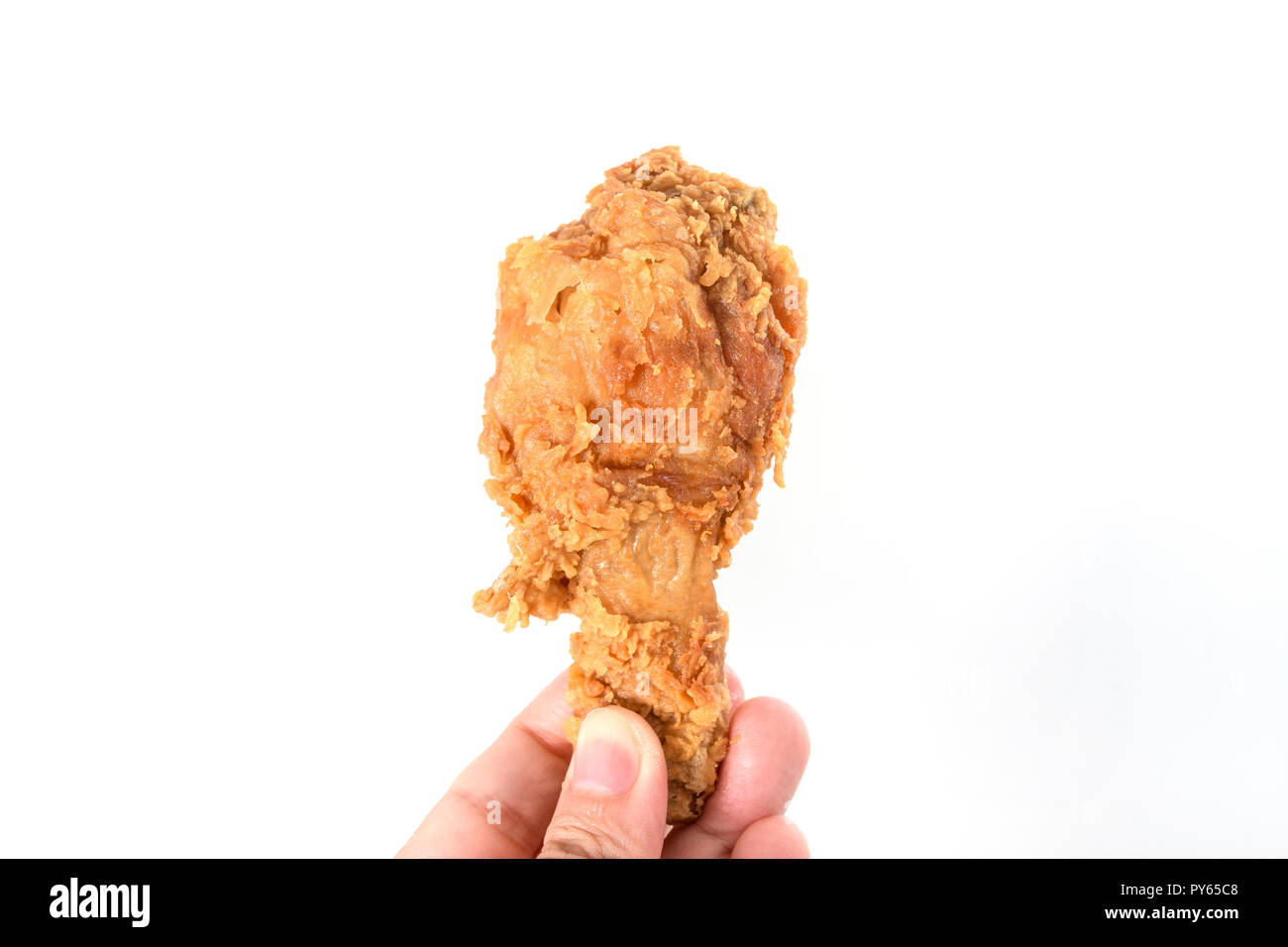 Hand hold fried chicken isolated on white Stock Photo - Alamy