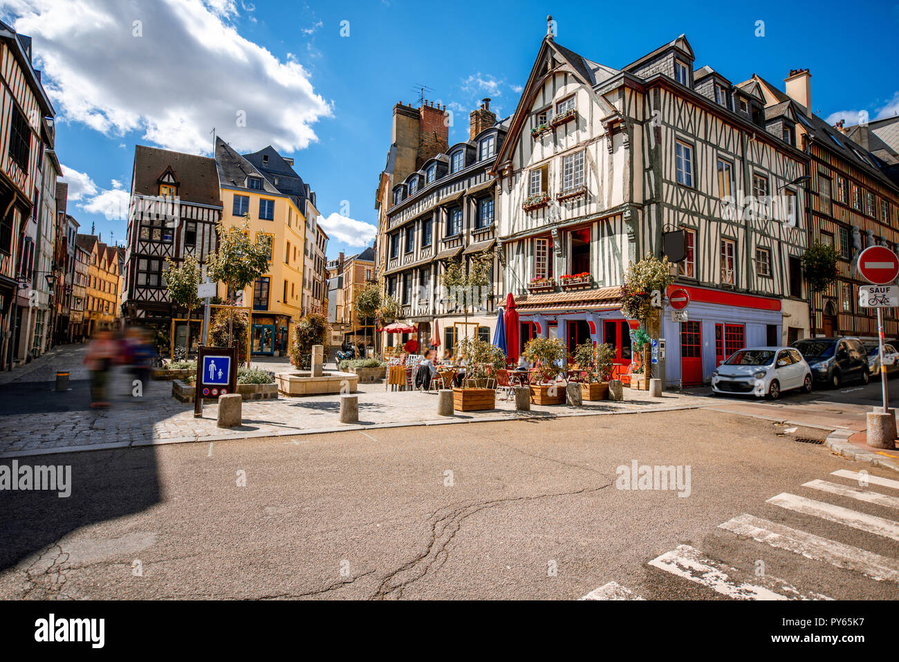 Cozy square with beautiful buildings and cafes in Rouen city, the ...