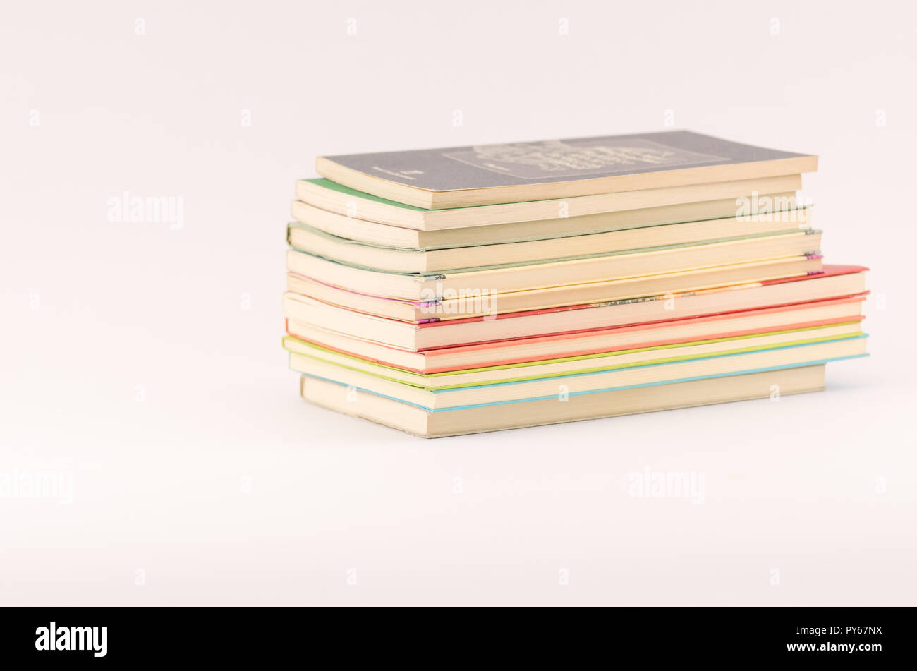 books and manuals on a white background - reading and culture concept ...