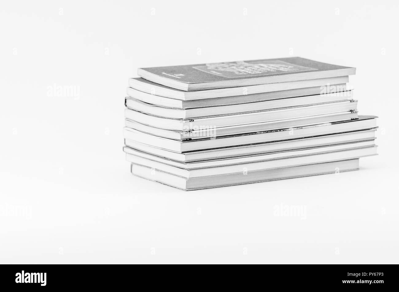 books and manuals on a white background - reading and culture concept ...