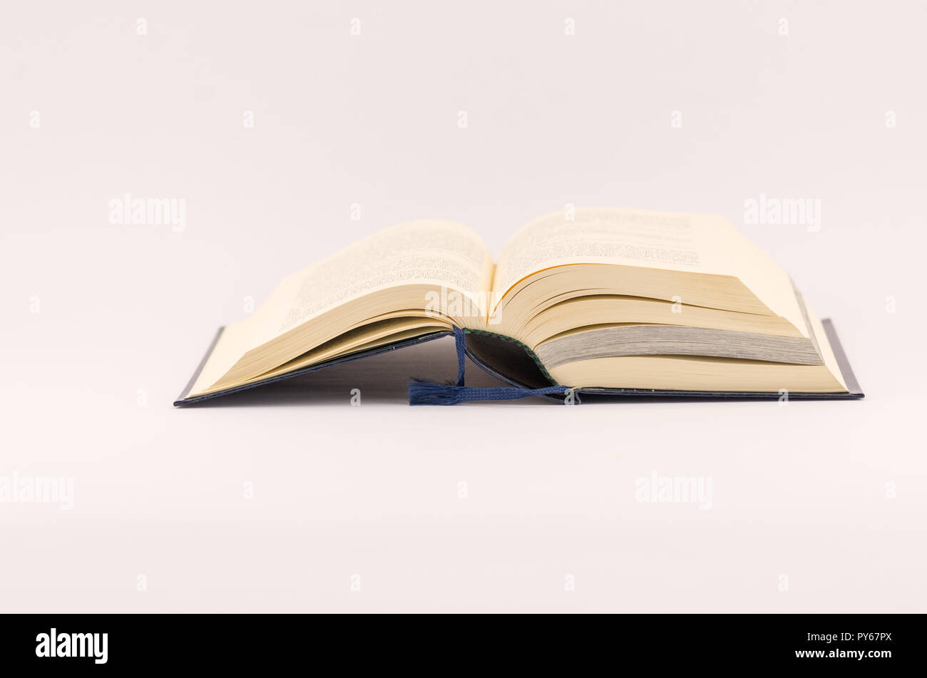 books and manuals on a white background - reading and culture concept ...