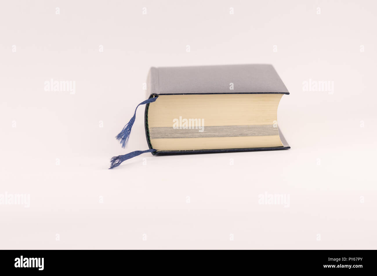 books and manuals on a white background - reading and culture concept ...