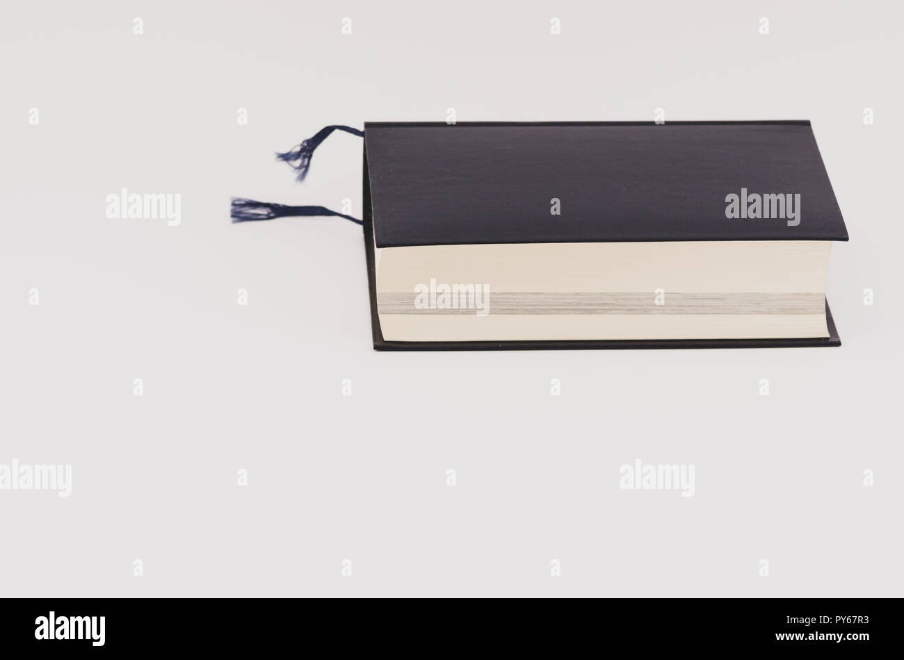 books and manuals on a white background - reading and culture concept ...