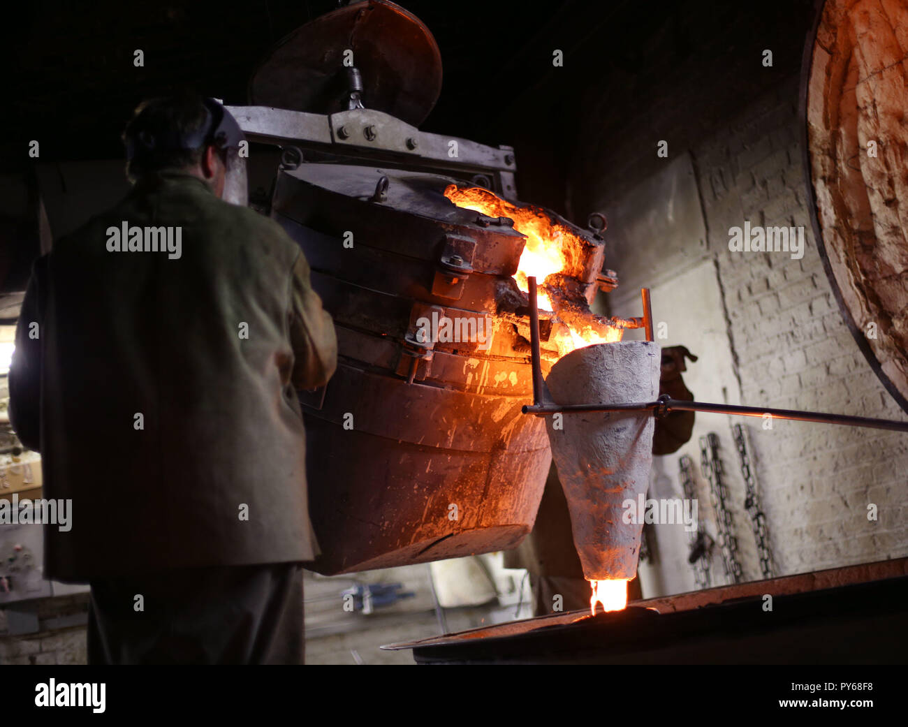 A foundry worker during the casting of Our Emmeline, a bronze statue of ...