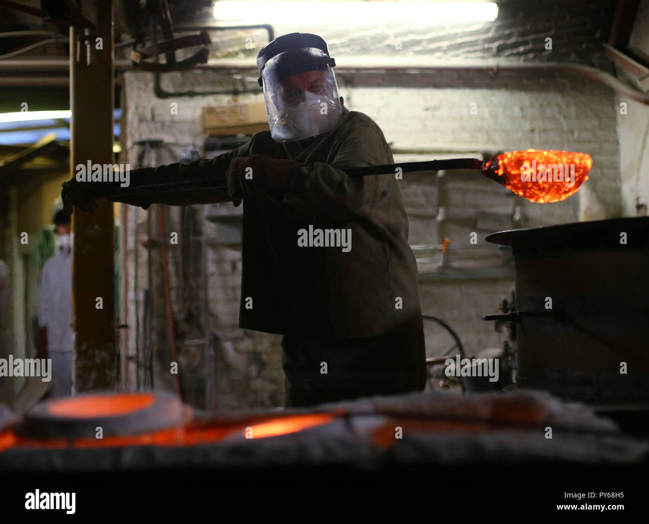 A foundry worker during the casting of Our Emmeline, a bronze statue of ...