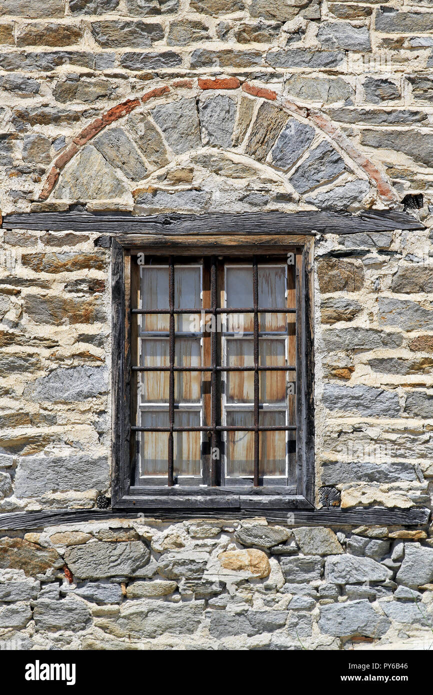 Window with bars at medieval Ouranopoli castle Stock Photo - Alamy