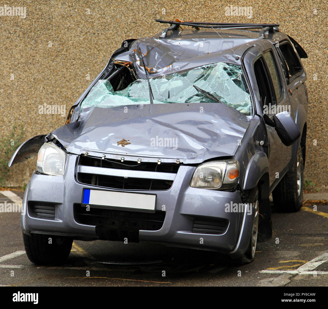 Unrecognizable SUV after roll over crush Stock Photo - Alamy