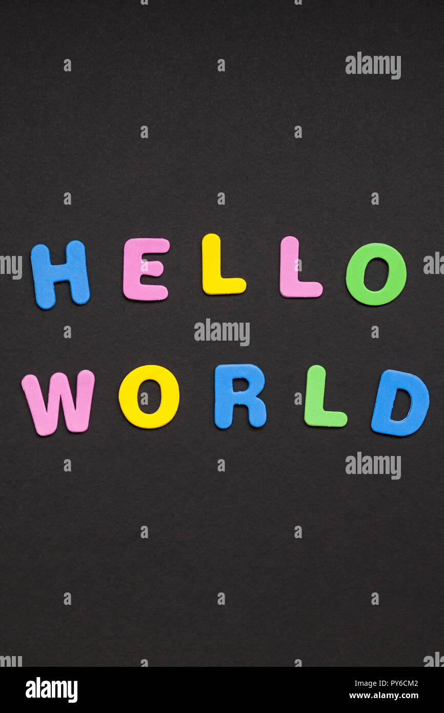 Creative colorful text made from plastic letters Hello world writing on ...