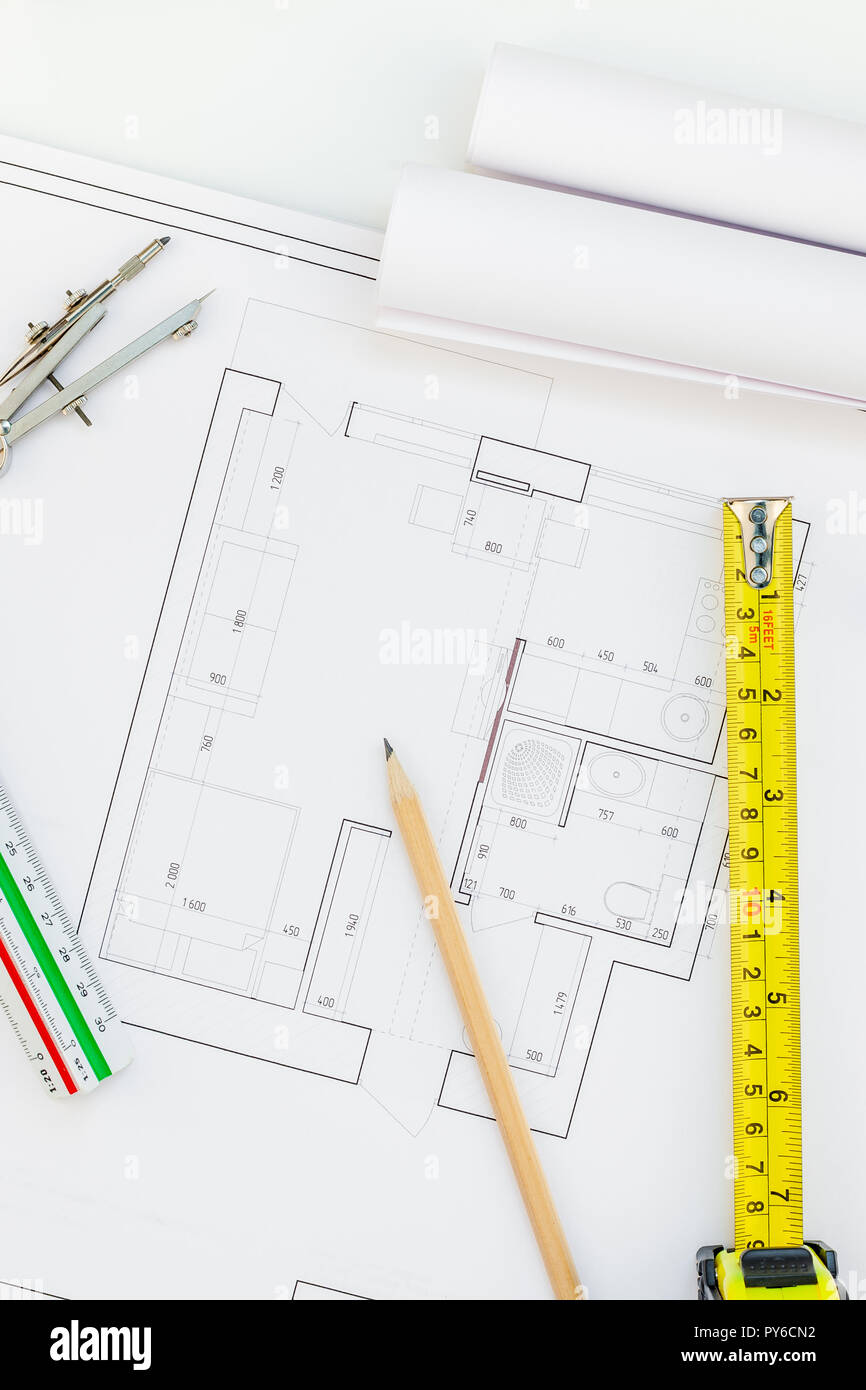 Creative flat lay overhead top view blueprints architectural flat ...