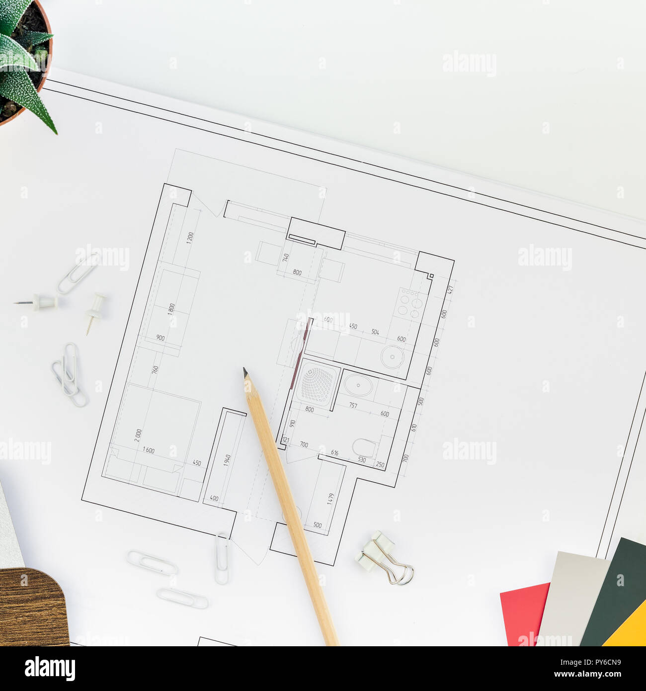 Creative flat lay overhead top view blueprints architectural flat ...