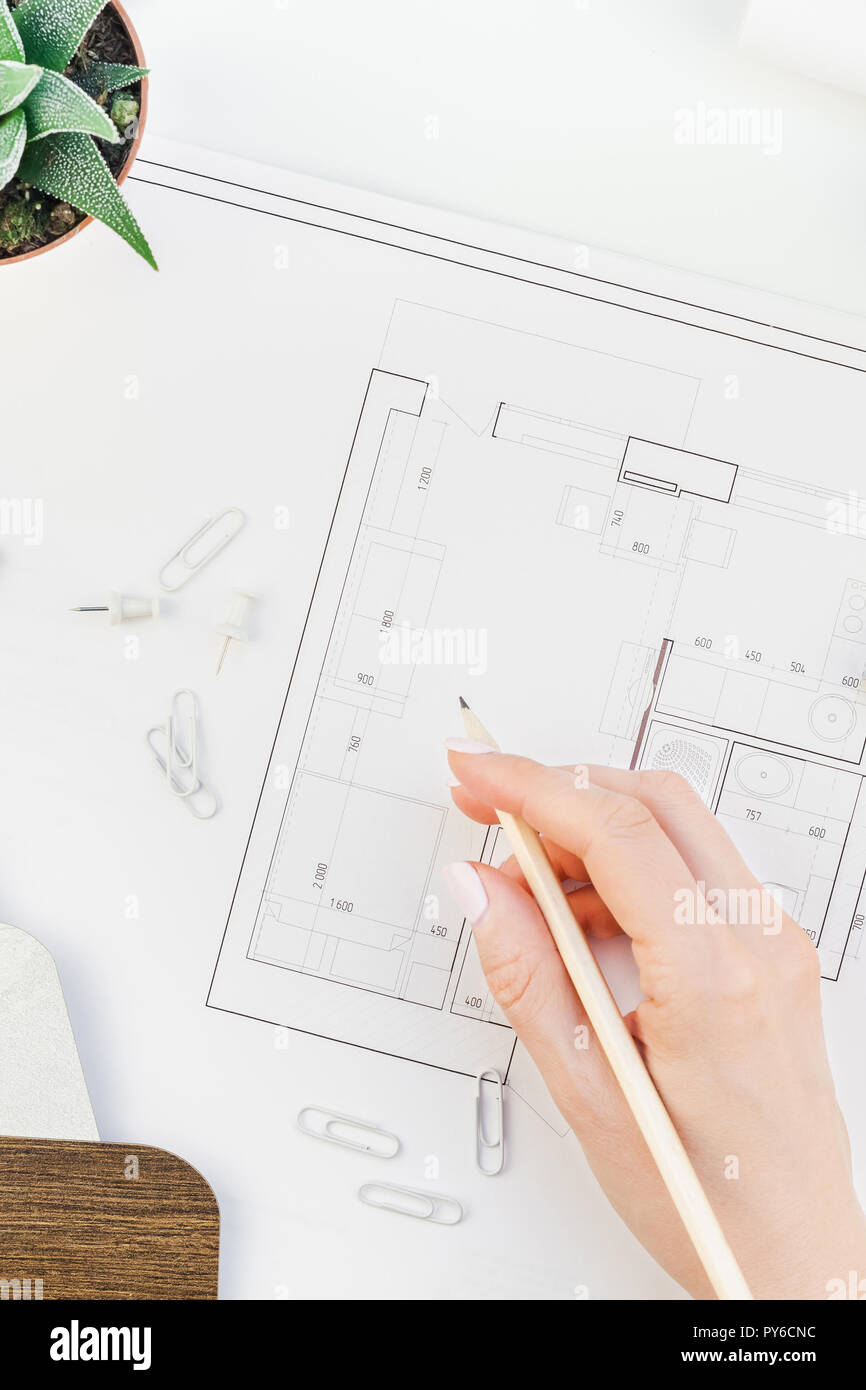 Creative flat lay overhead top view blueprints architectural flat ...