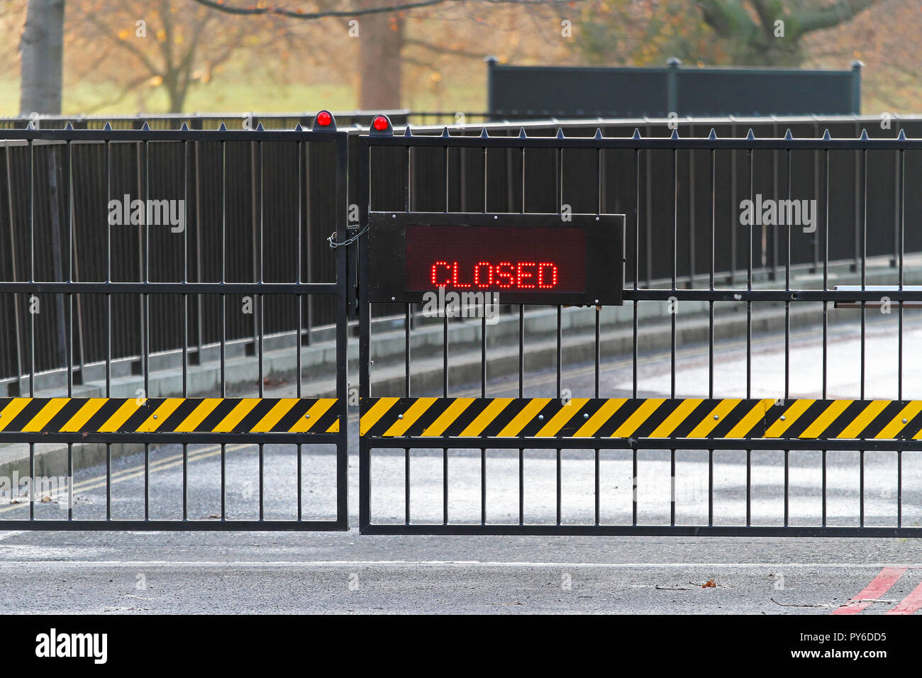 Closed gate with red LED information display Stock Photo - Alamy