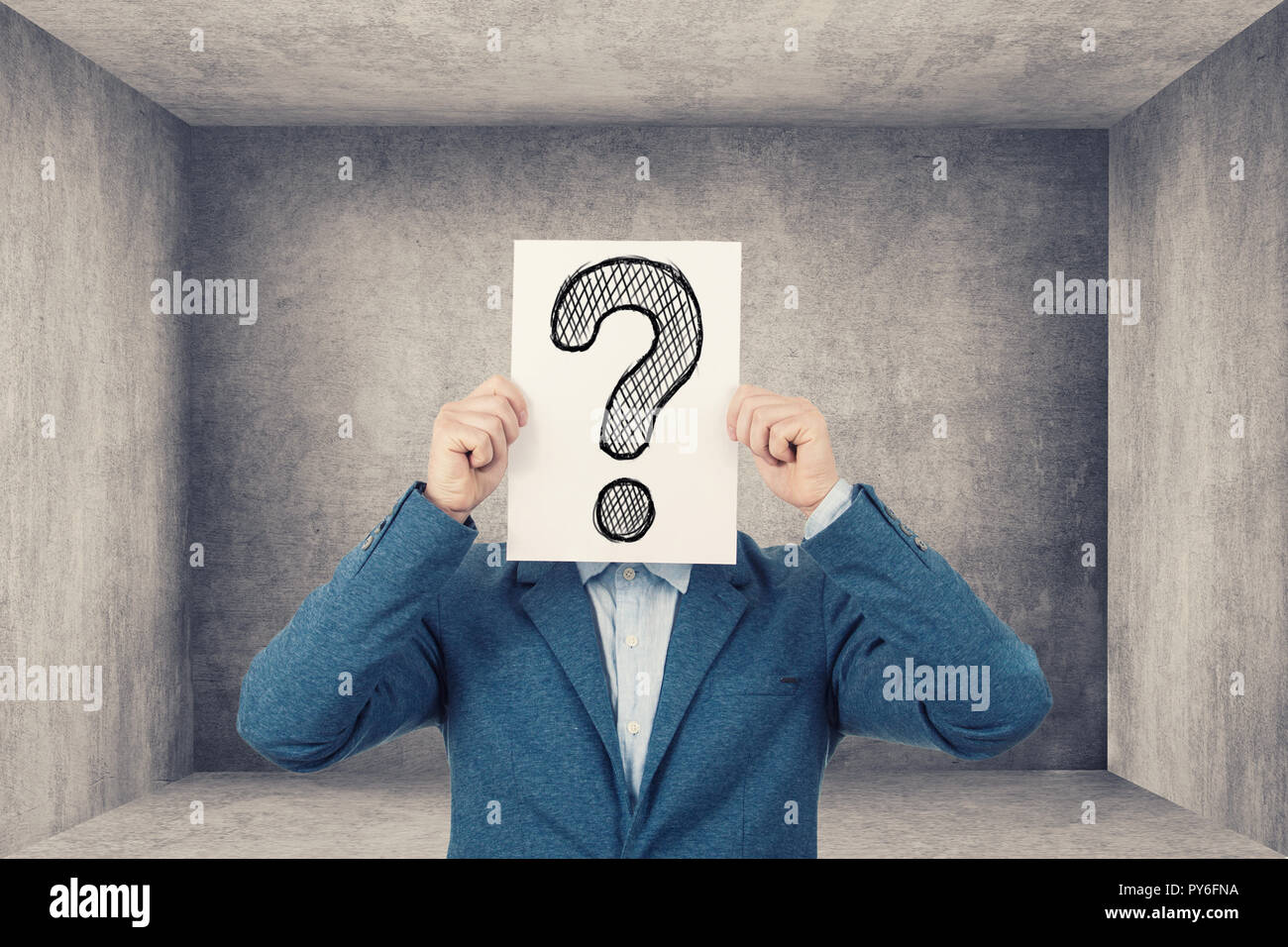 Perplexed young student businessman holding to white papers with ...