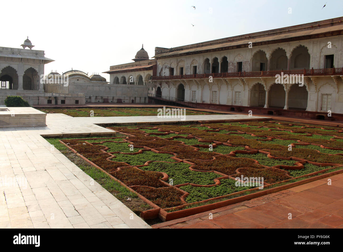the architecture of courtyards and gardens inside the complex of Agra ...