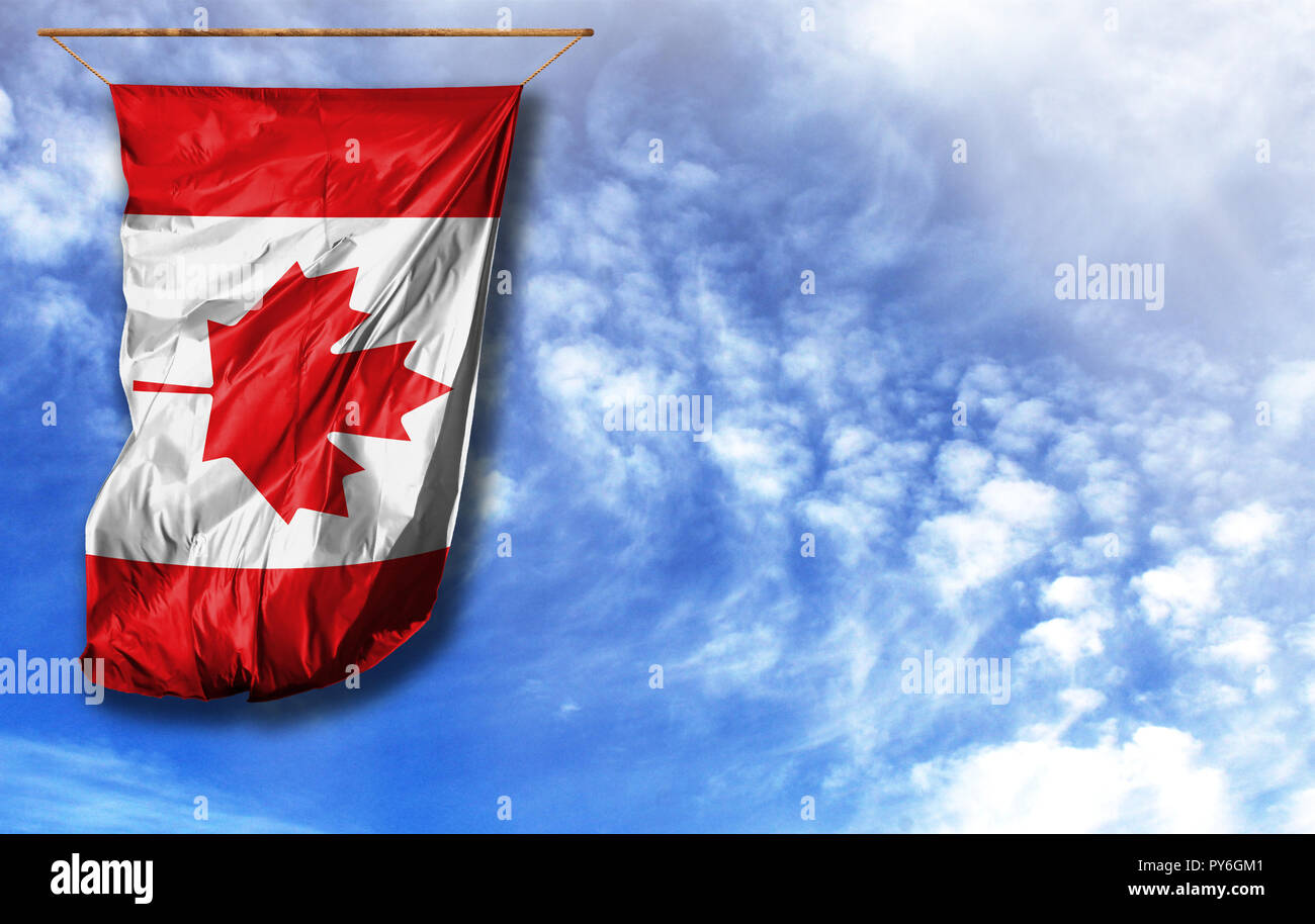Flag of Canada. Vertical flag, against blue sky with place for your ...