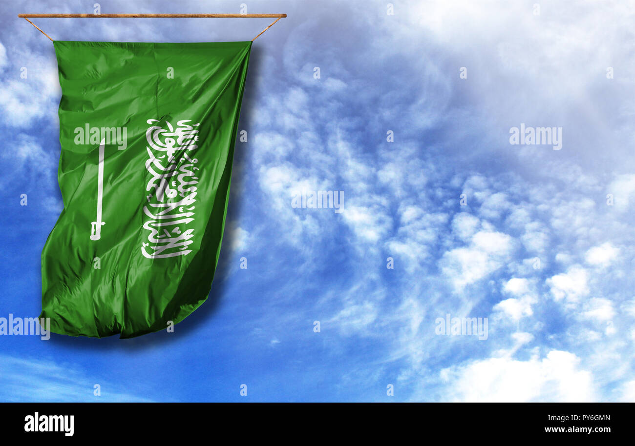 Flag of Saudi Arabia. Vertical flag, against blue sky with place for ...