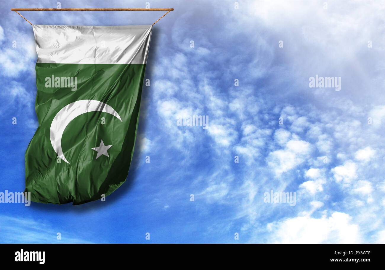 Flag of Pakistan. Vertical flag, against blue sky with place for your ...