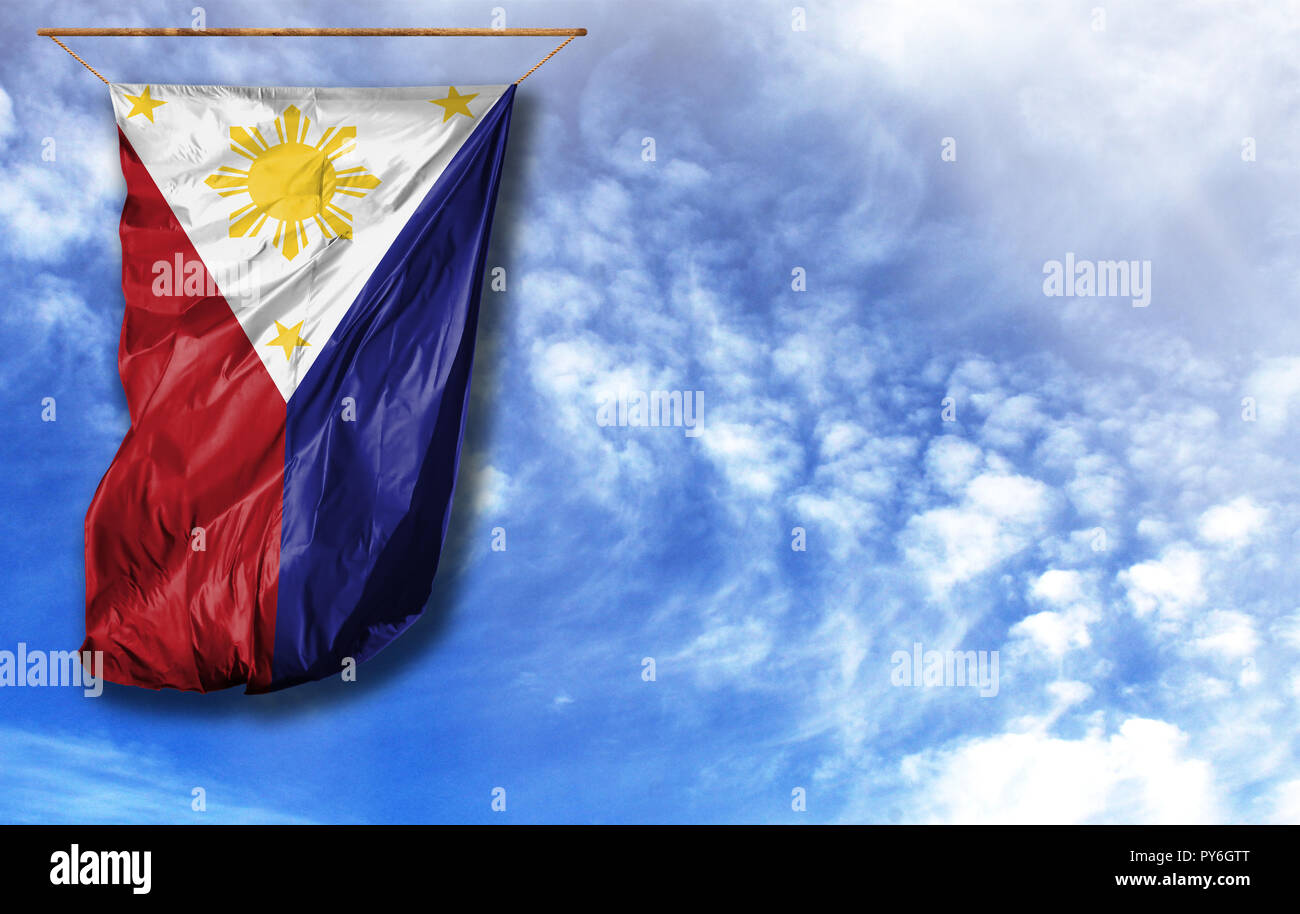 Flag of Philippines. Vertical flag, against blue sky with place for ...
