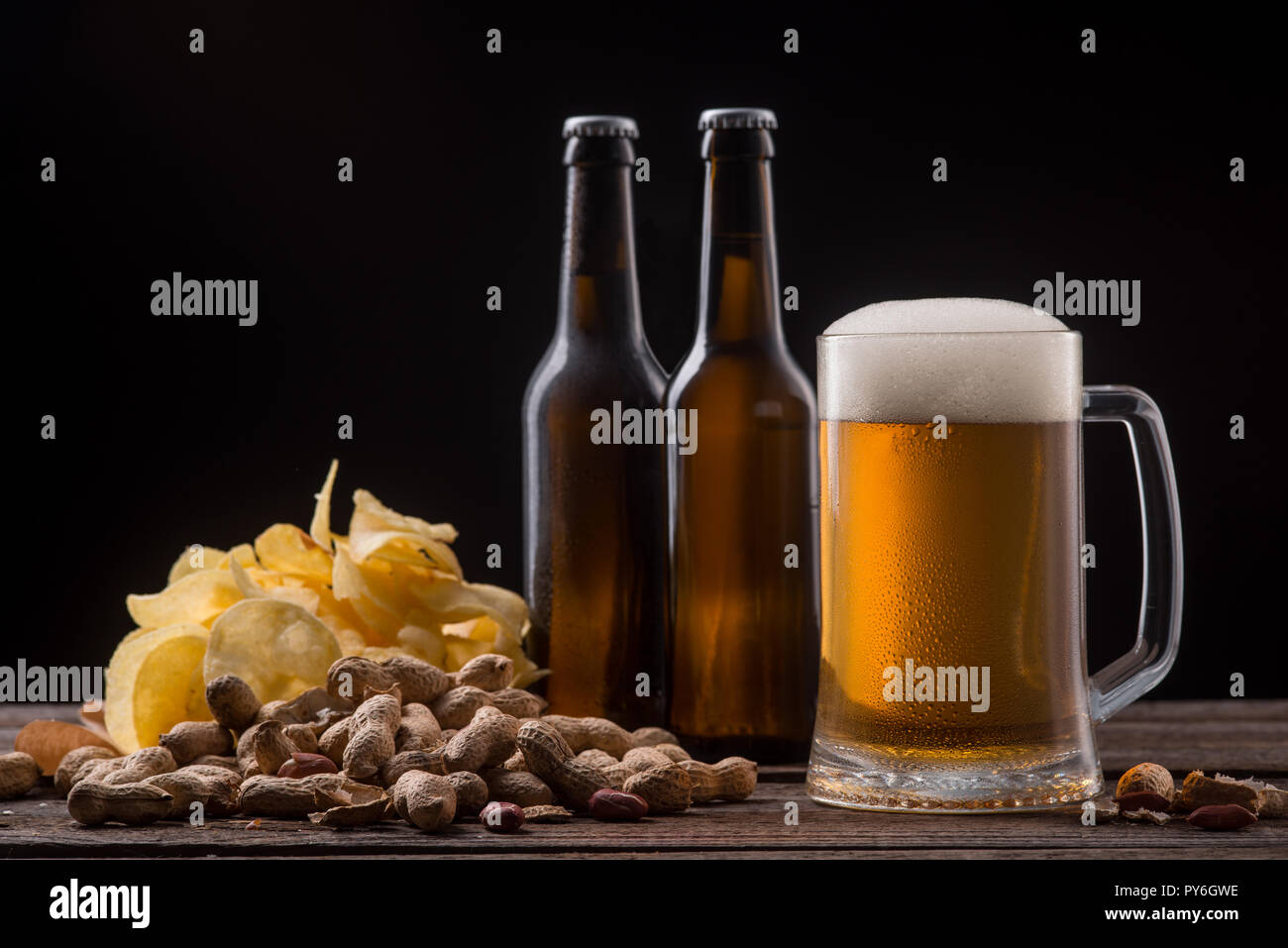 Beer, chips and peanuts Stock Photo - Alamy